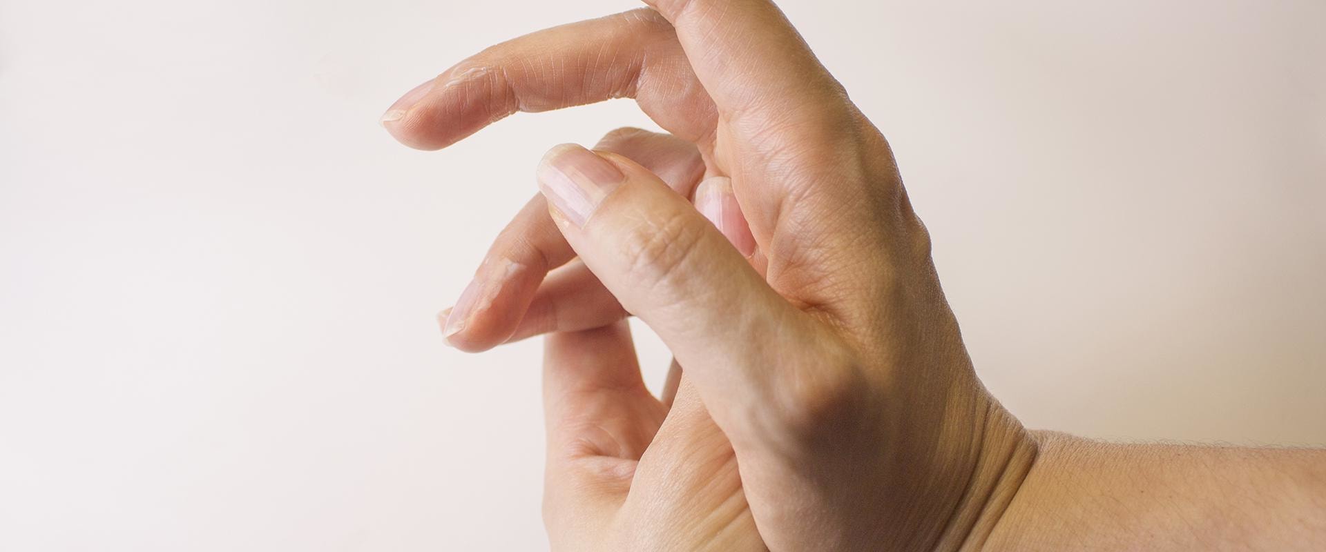 Pressure points for headaches in the hands?